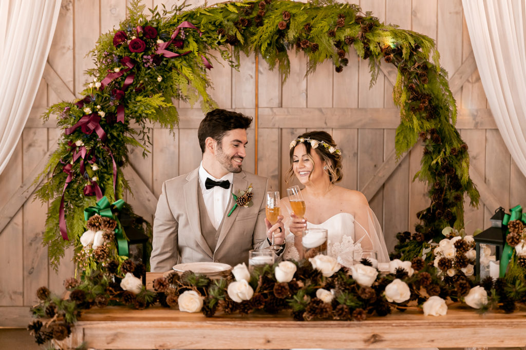 Rustic Green + White Winter Wedding at a Barn in the Snow